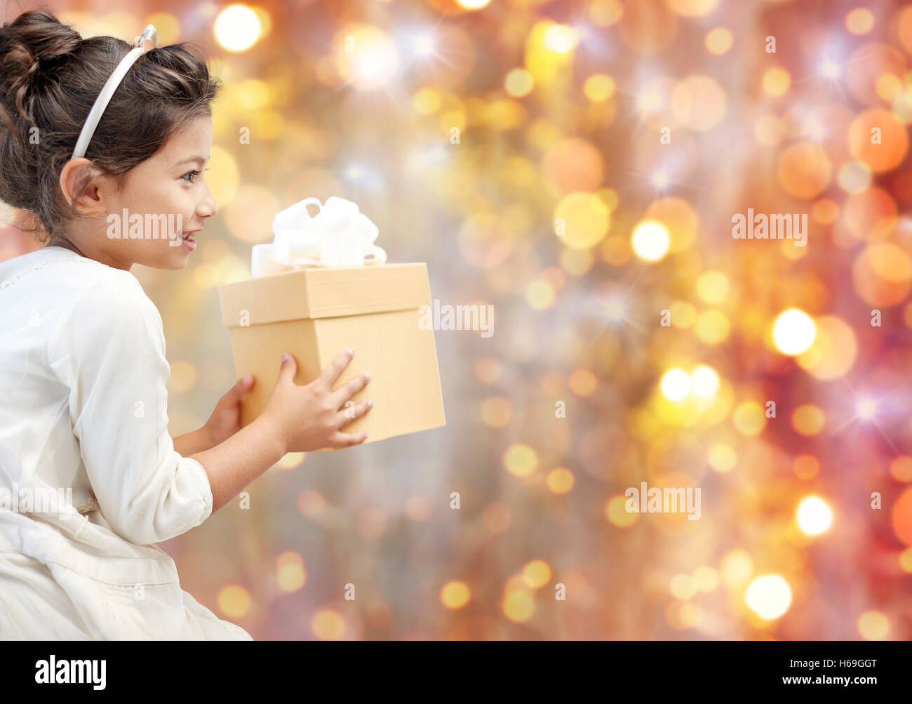 smiling little girl with gift box Stock Photo - Alamy