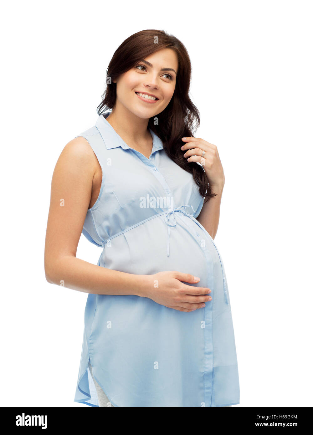 happy pregnant woman touching her big belly Stock Photo - Alamy