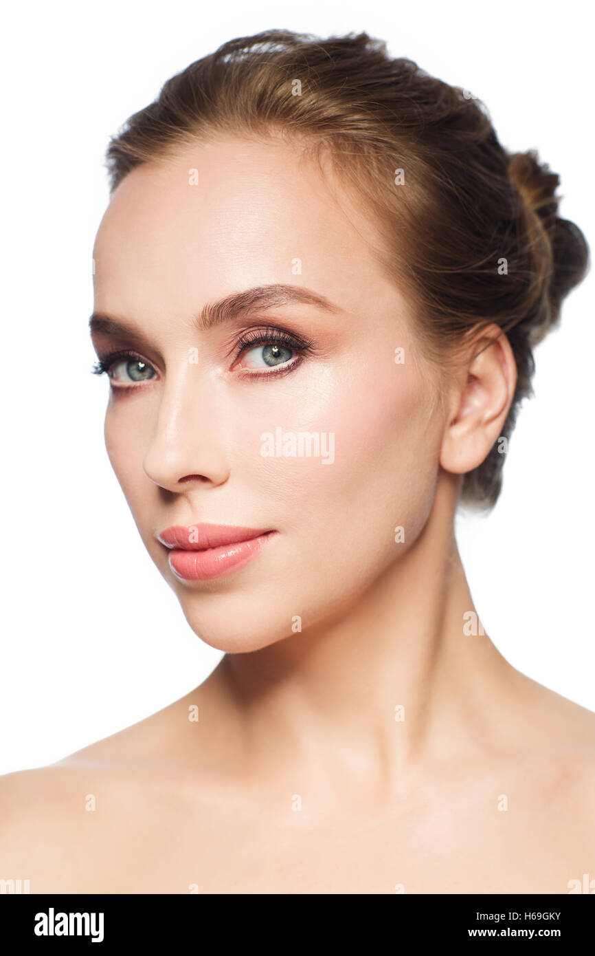 beautiful young woman face over white background Stock Photo - Alamy