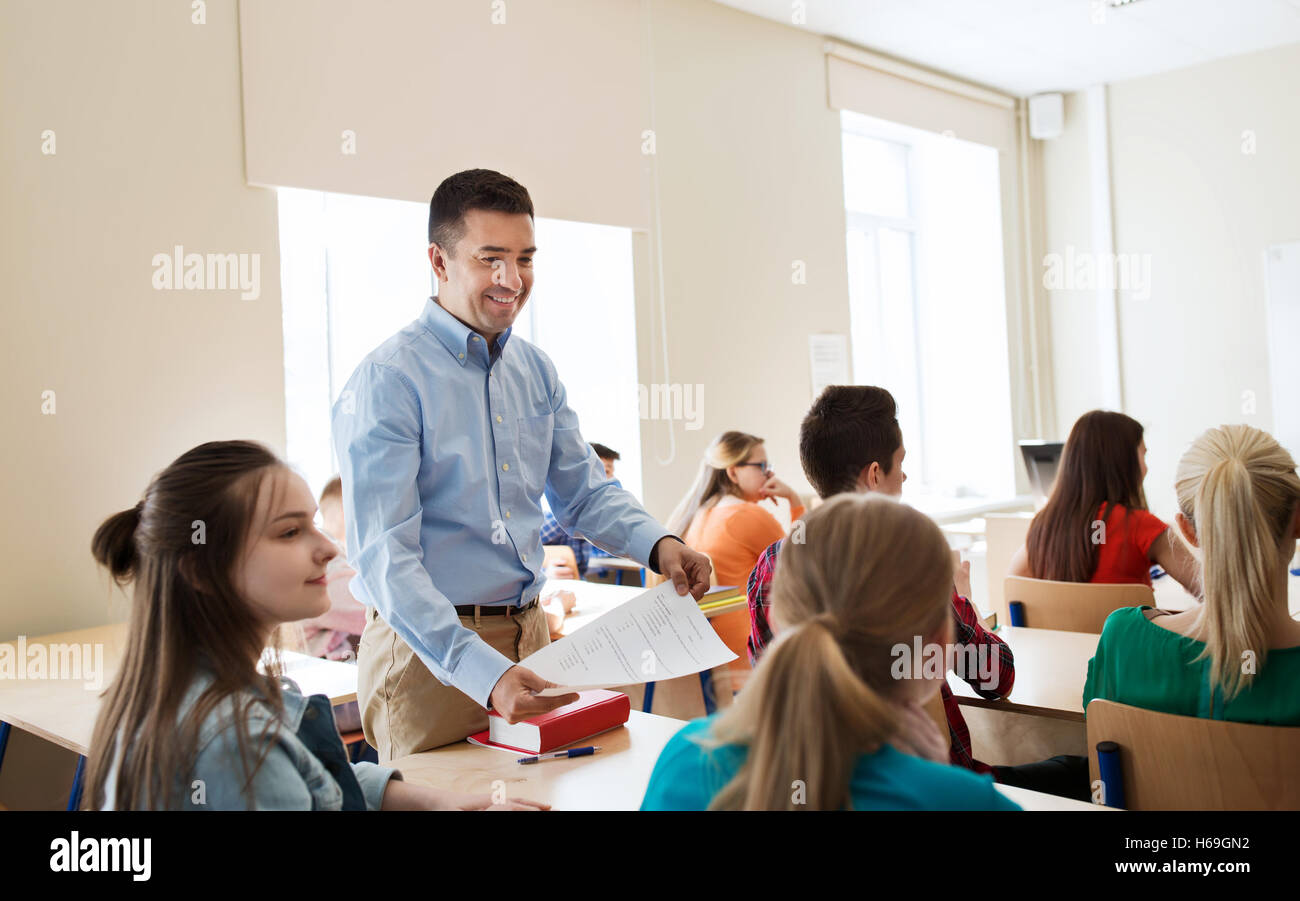 group of students and teacher with test results Stock Photo - Alamy