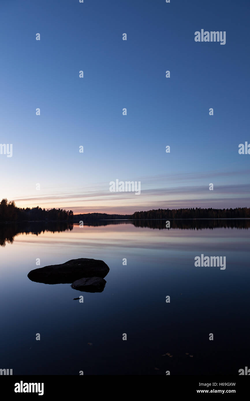 Serene view of calm lake Stock Photo - Alamy