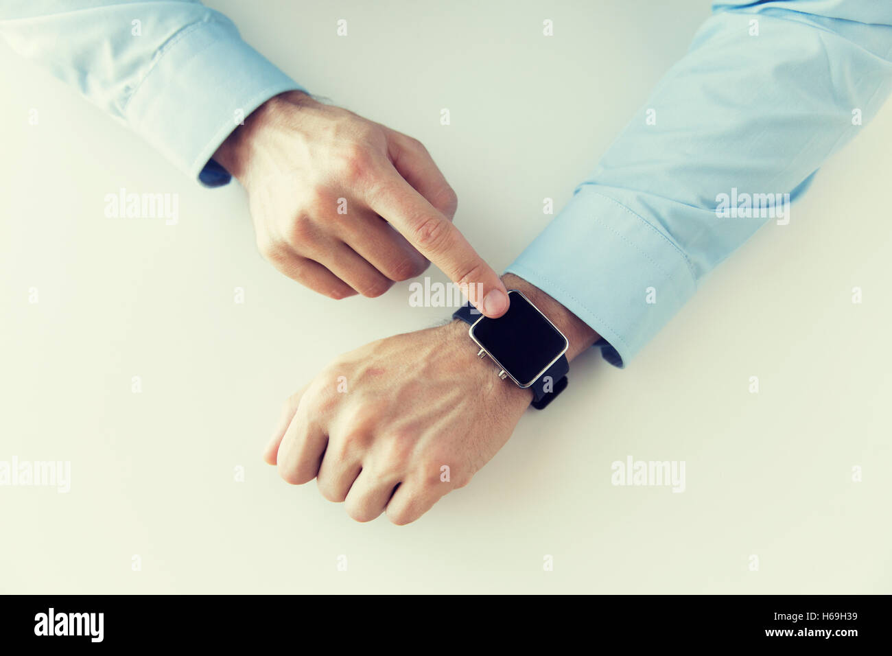 close up of male hands setting smart watch Stock Photo - Alamy