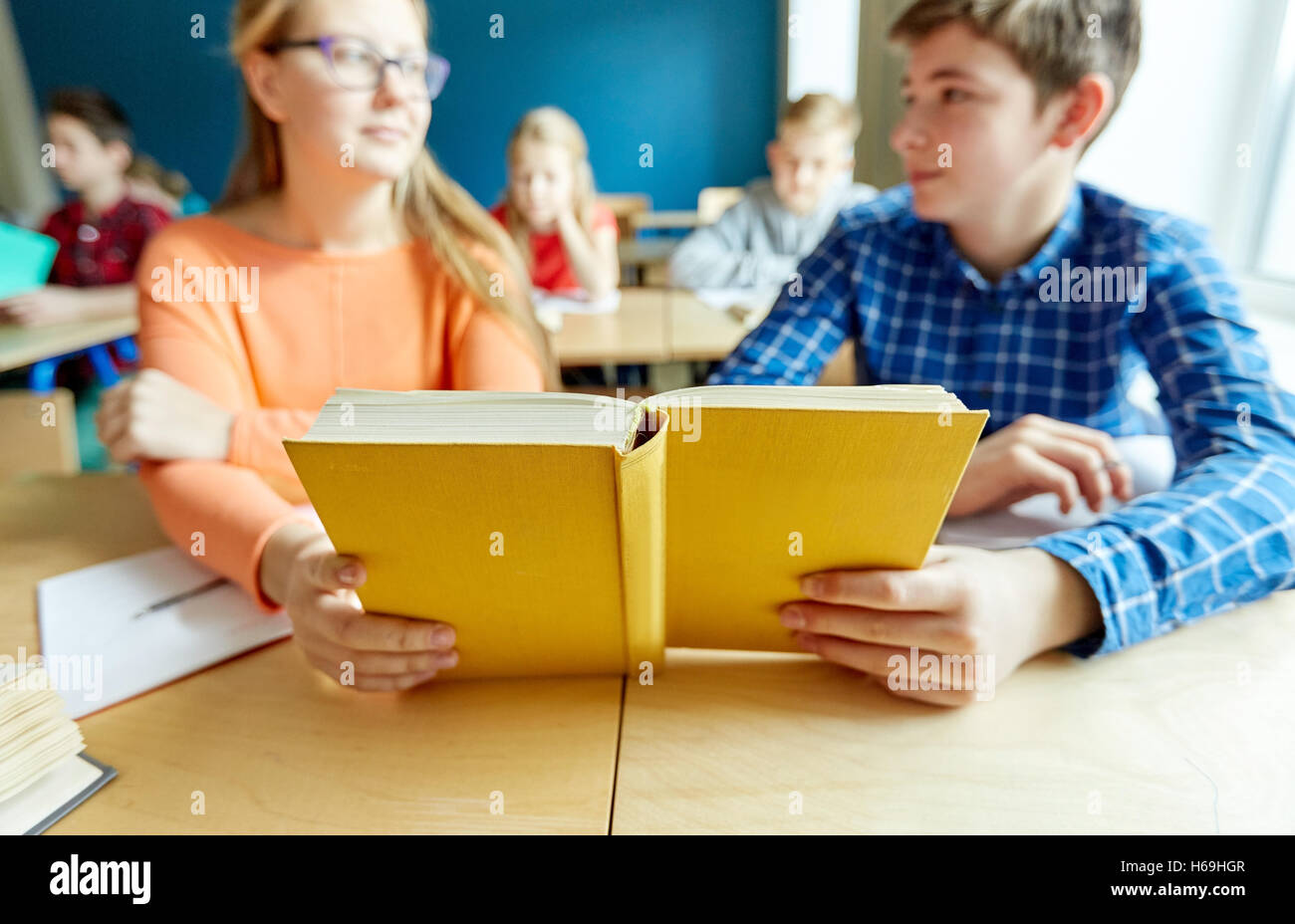 high school students reading book and learning Stock Photo - Alamy