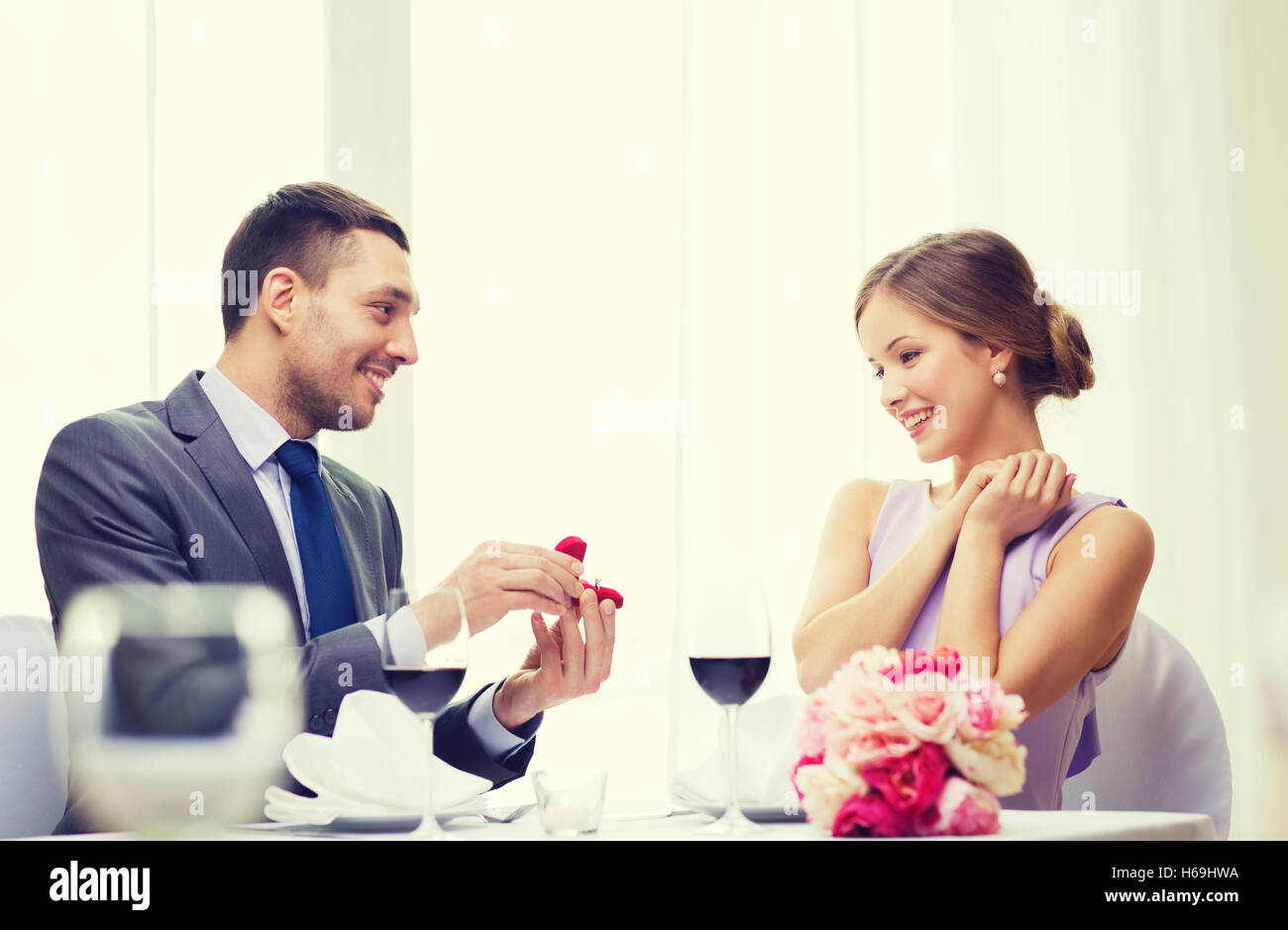 man proposing to his girlfriend at restaurant Stock Photo - Alamy