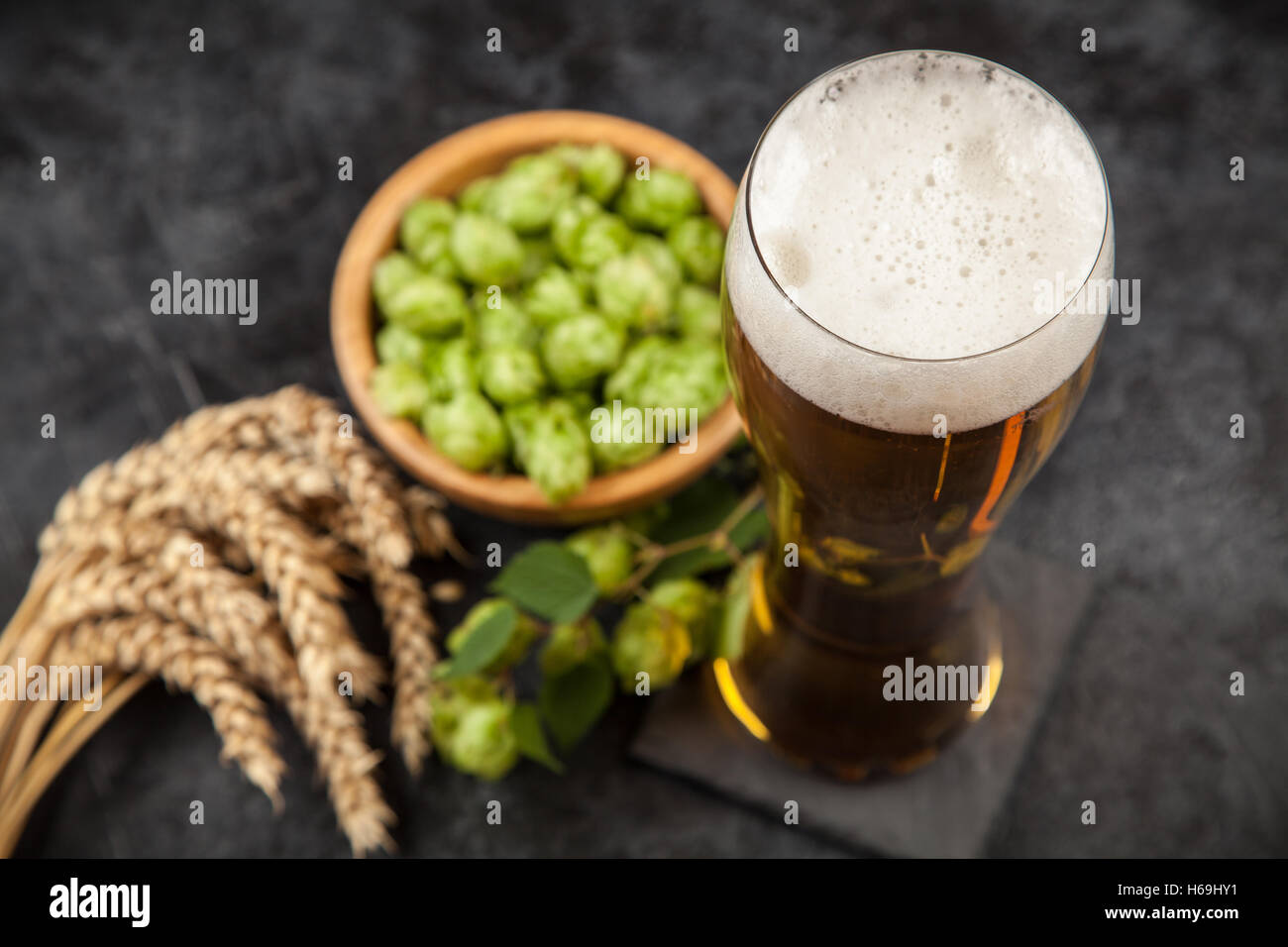 Beer glass on dark background Stock Photo - Alamy