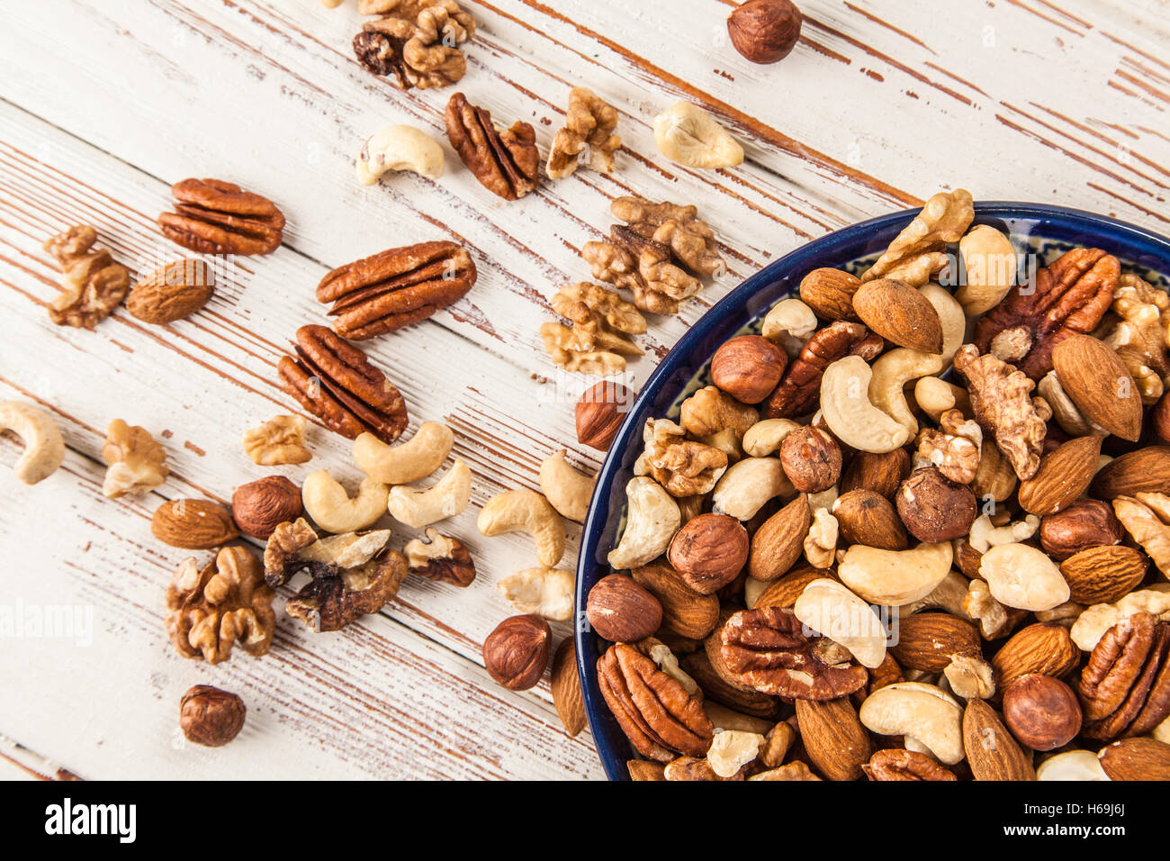 Mix of different nuts closeup photo Stock Photo - Alamy