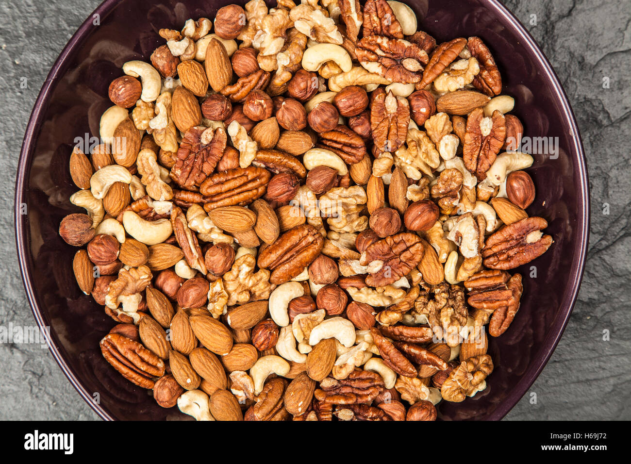 Mix of different nuts closeup photo Stock Photo - Alamy
