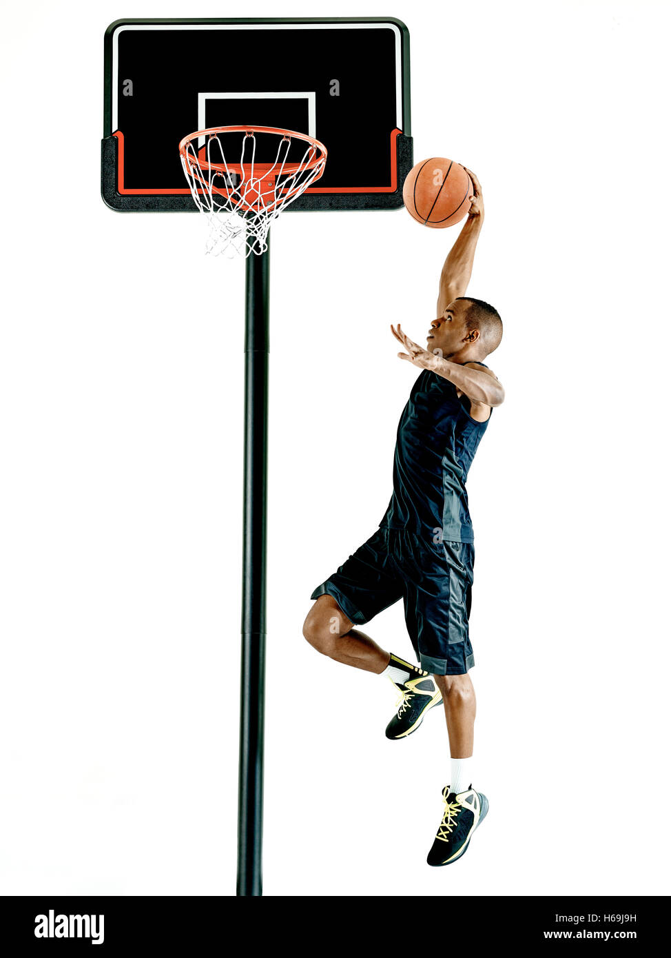 one basketball player man Isolated on white background Stock Photo - Alamy