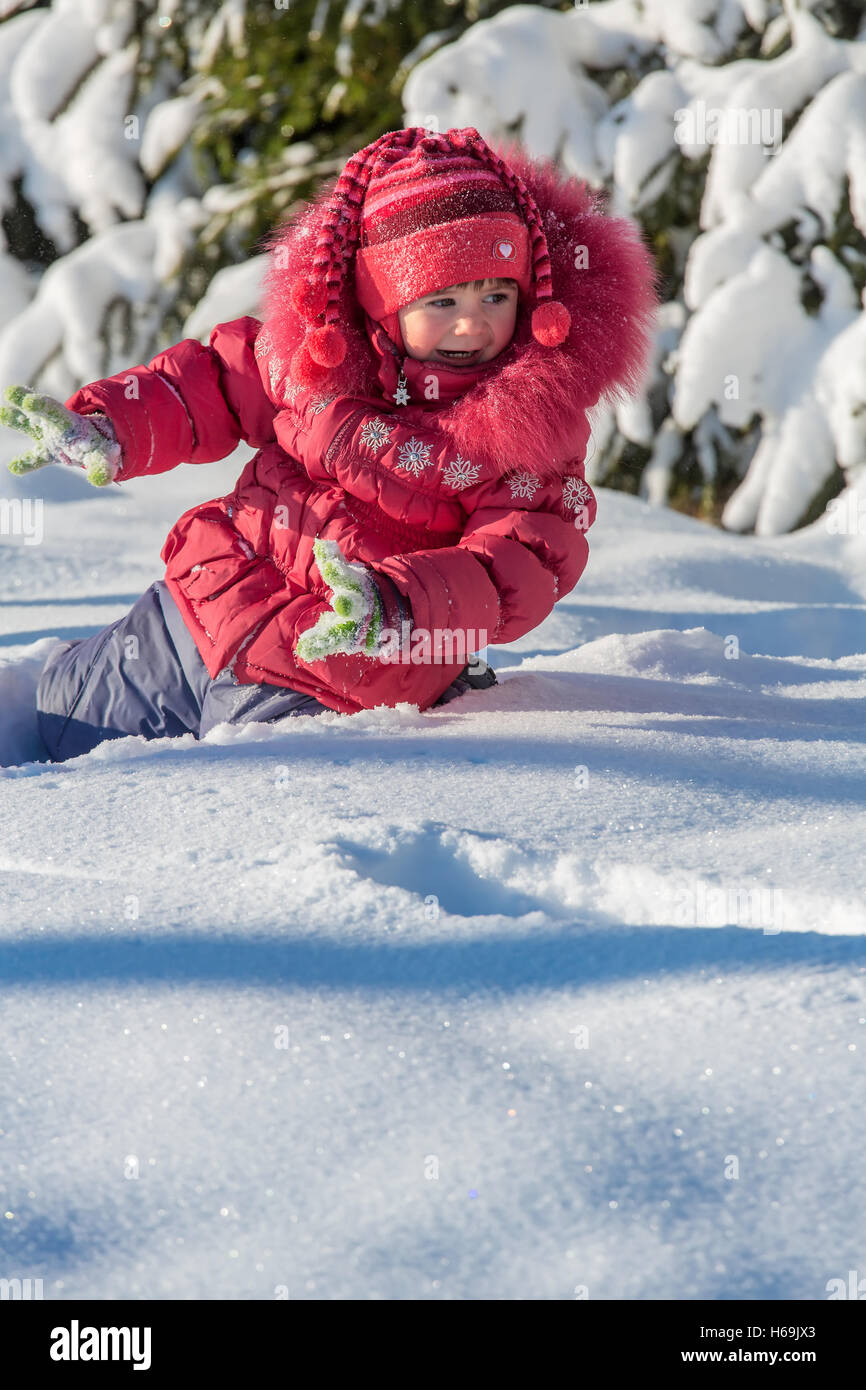 Little girls play at winter sunny day Stock Photo - Alamy