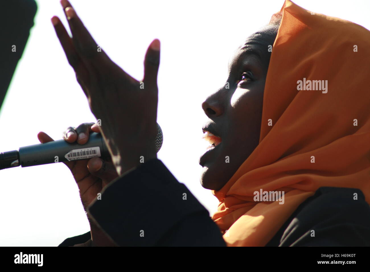Speakers talk to the hundreds of Syrian refugee solidarity supporters ...