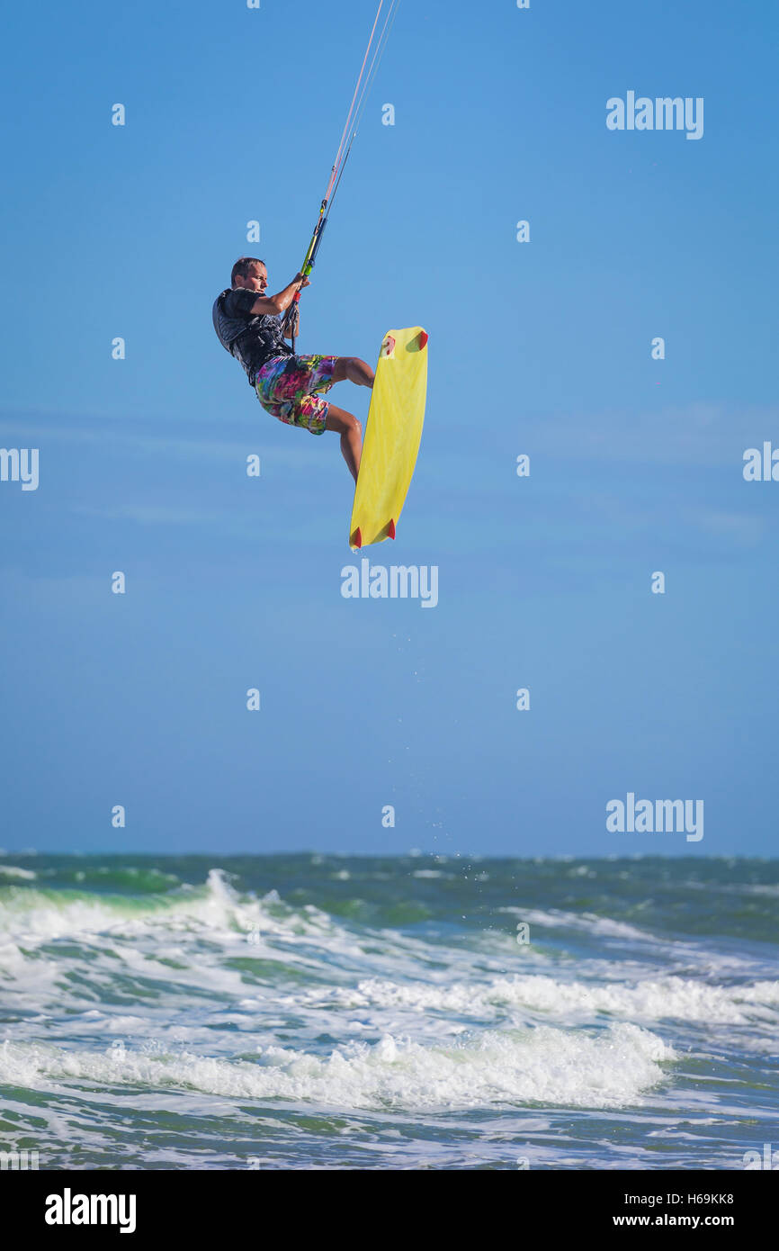 Athletic man jump on kite surf board on a sea waves Stock Photo - Alamy