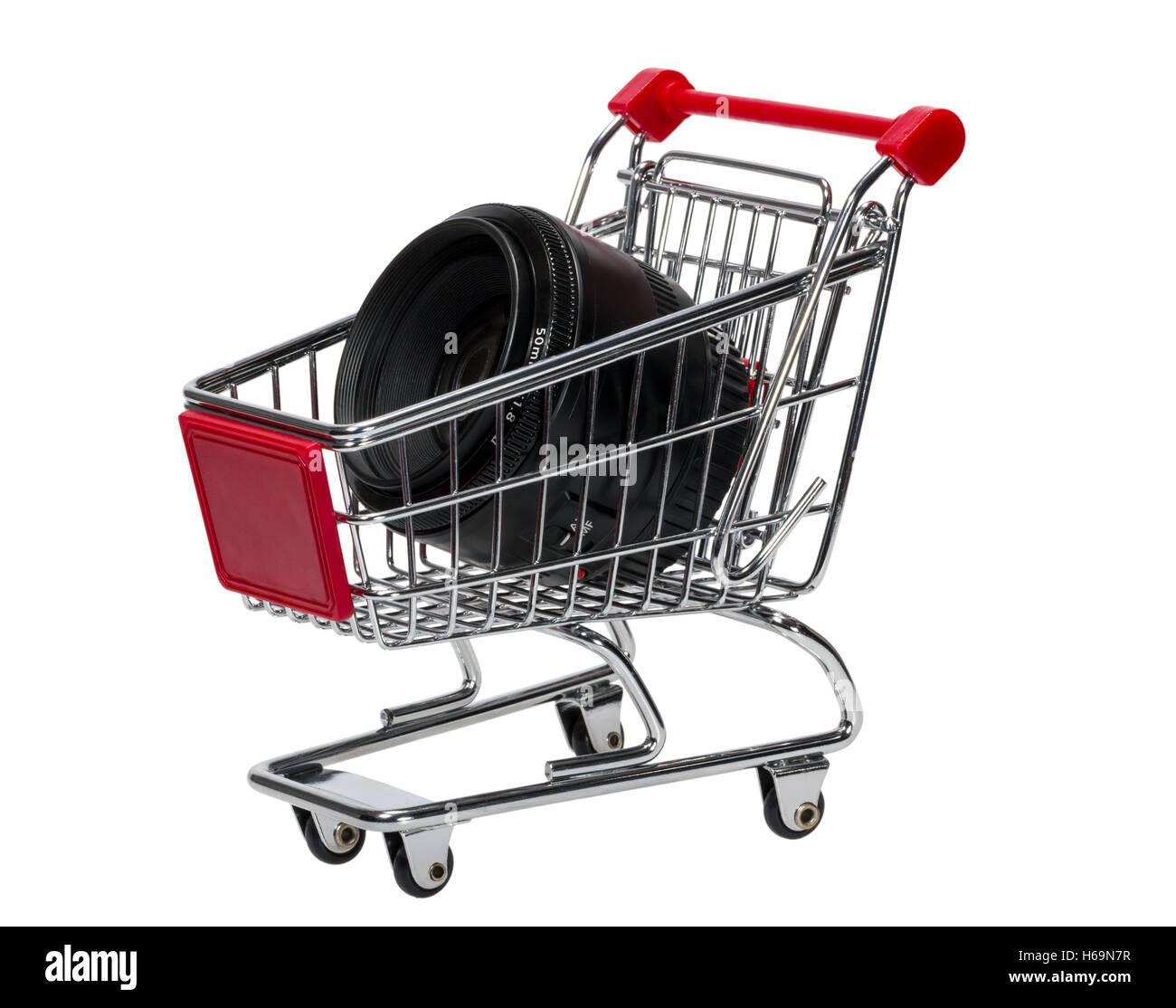 Shopping Cart with a camera lens isolated on white background Stock ...