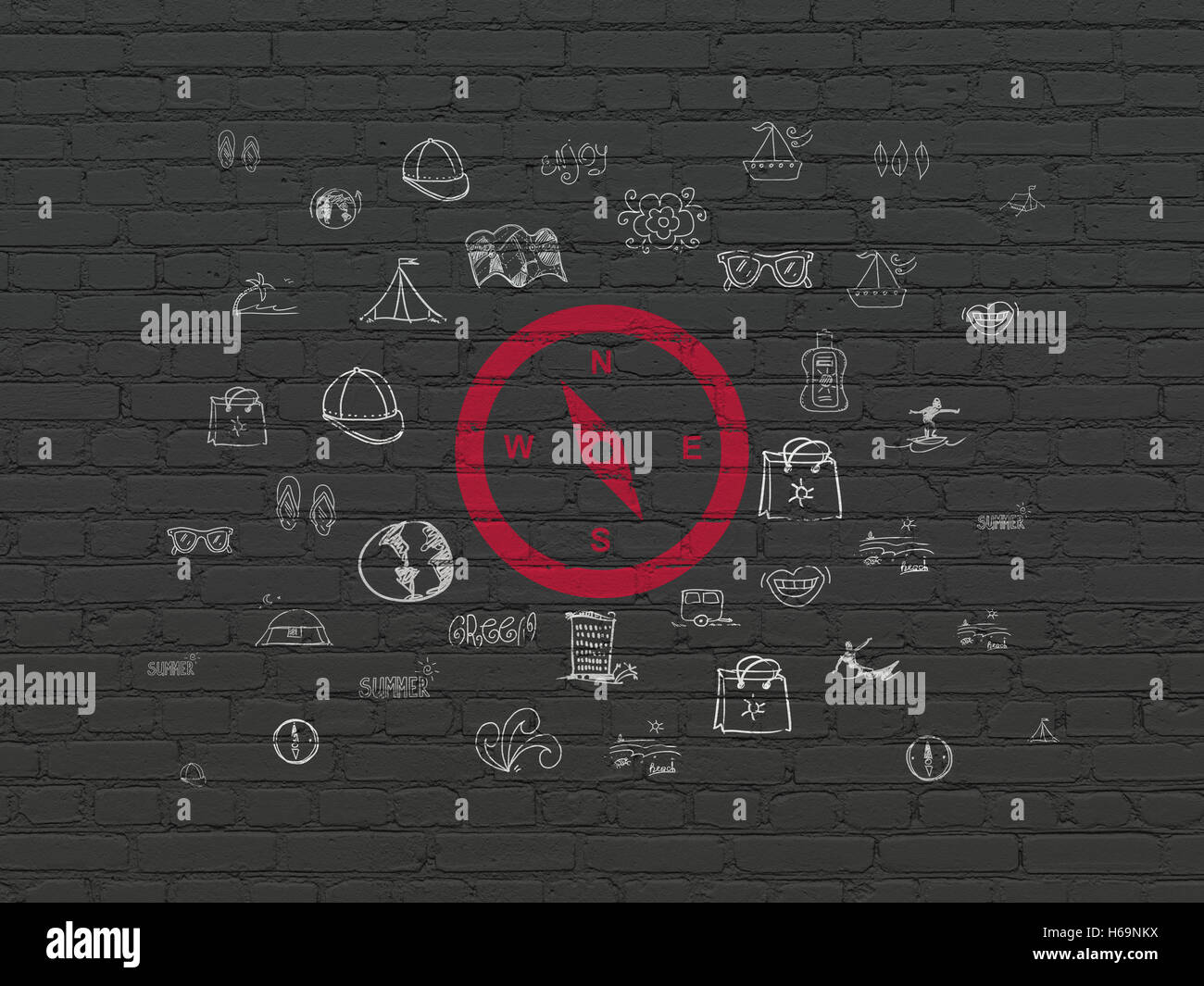 Travel concept: Compass on wall background Stock Photo - Alamy