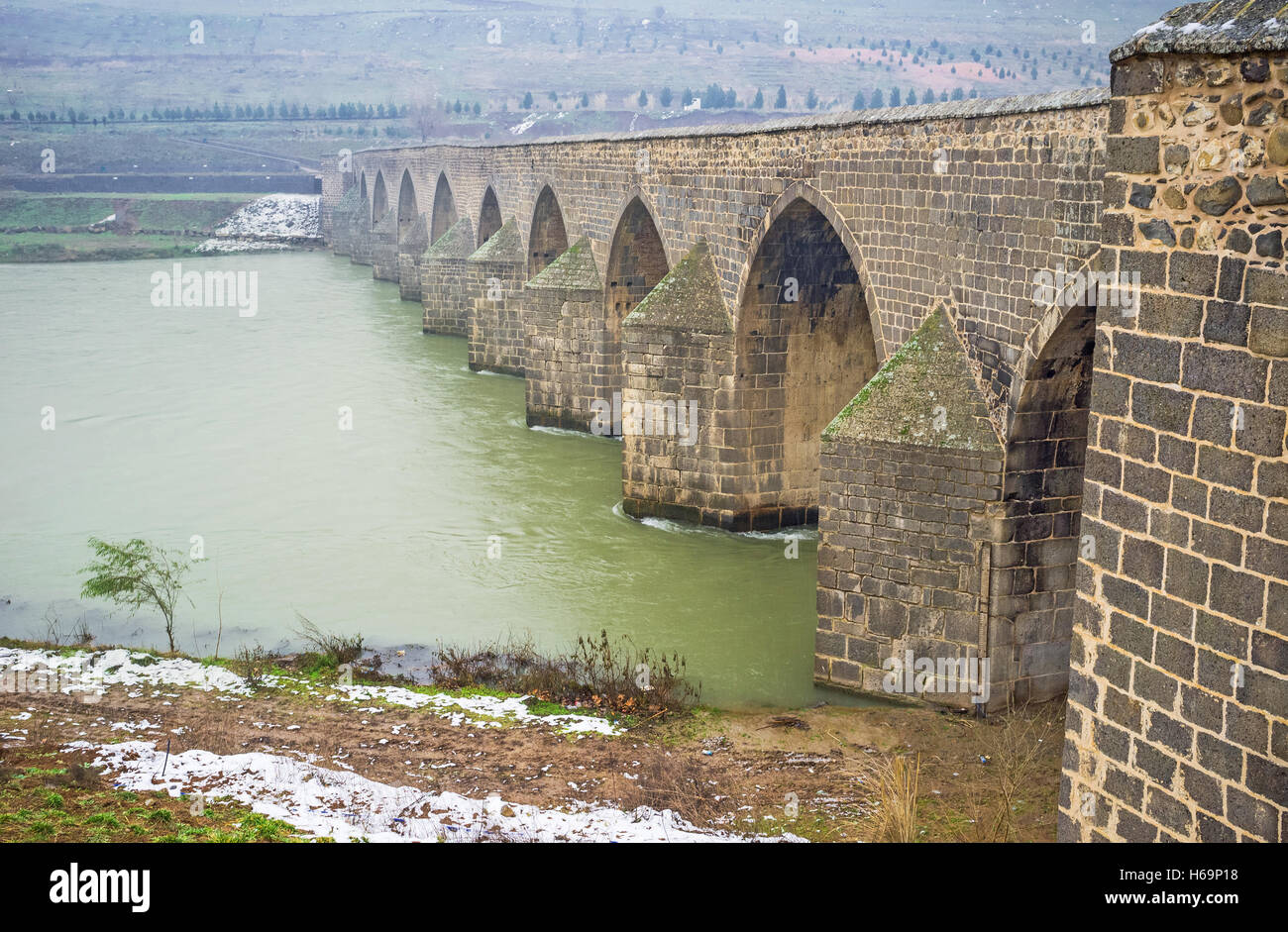 The ancient Dicle Bridge over the Tigris River is the notable landmark ...