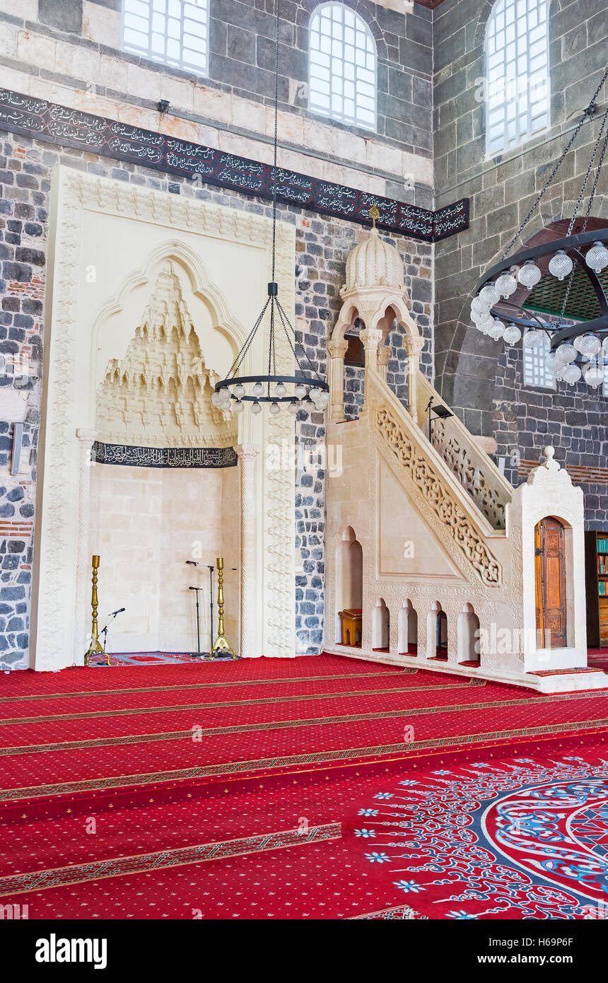 The black basalt interior of the Great Mosque decorated with the white ...