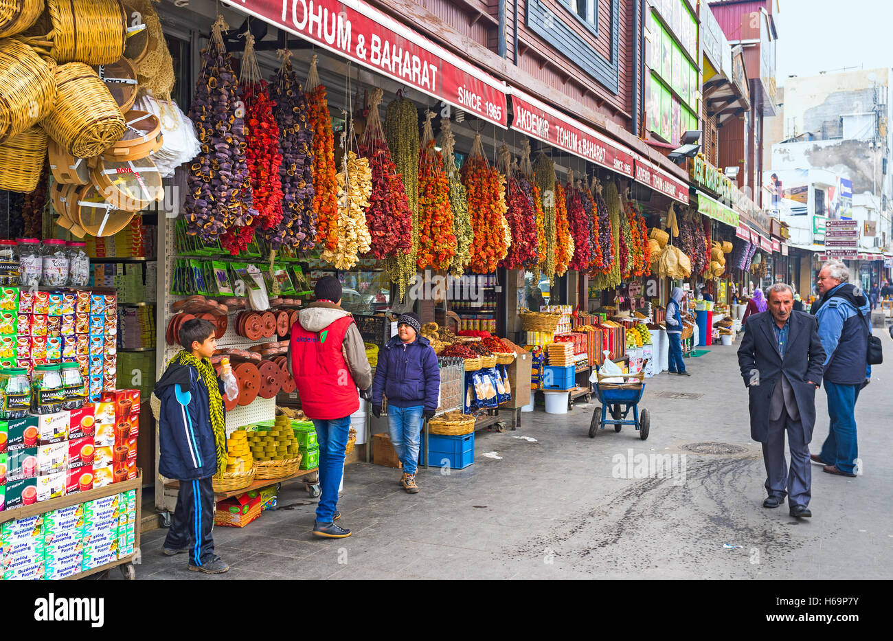 The colourful strings of dried vegetables, mainly eggplant and red ...