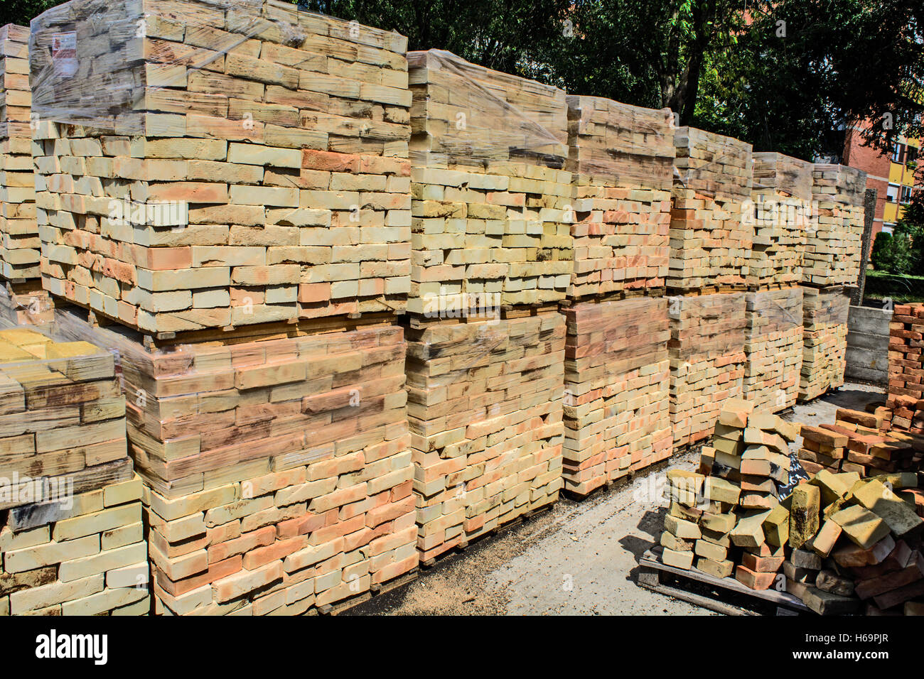 New brick packed and stacked waiting for sale Stock Photo - Alamy