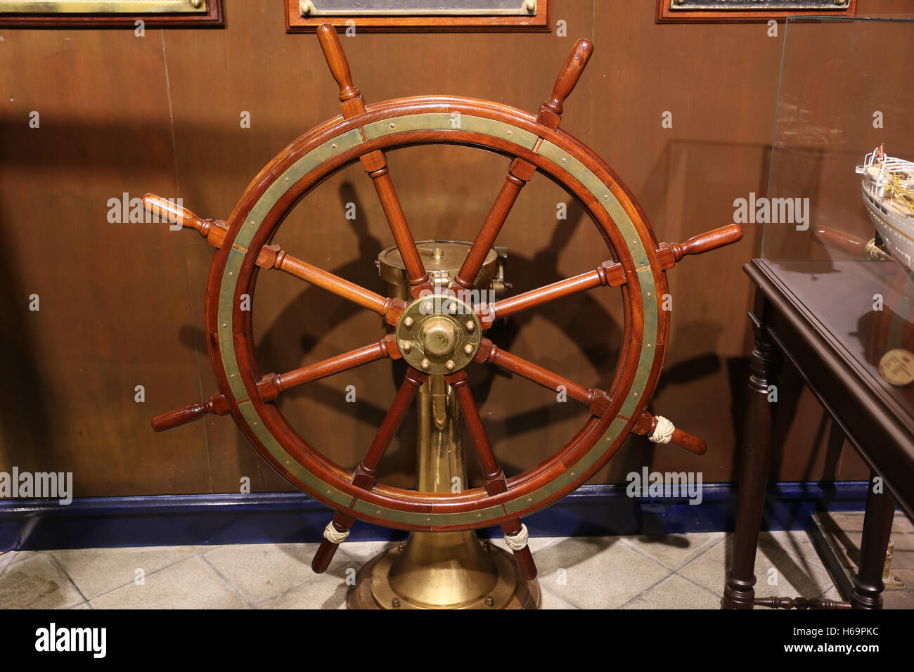 Yellow Metal and Brown Wooden Ship Rudder Stock Photo - Alamy