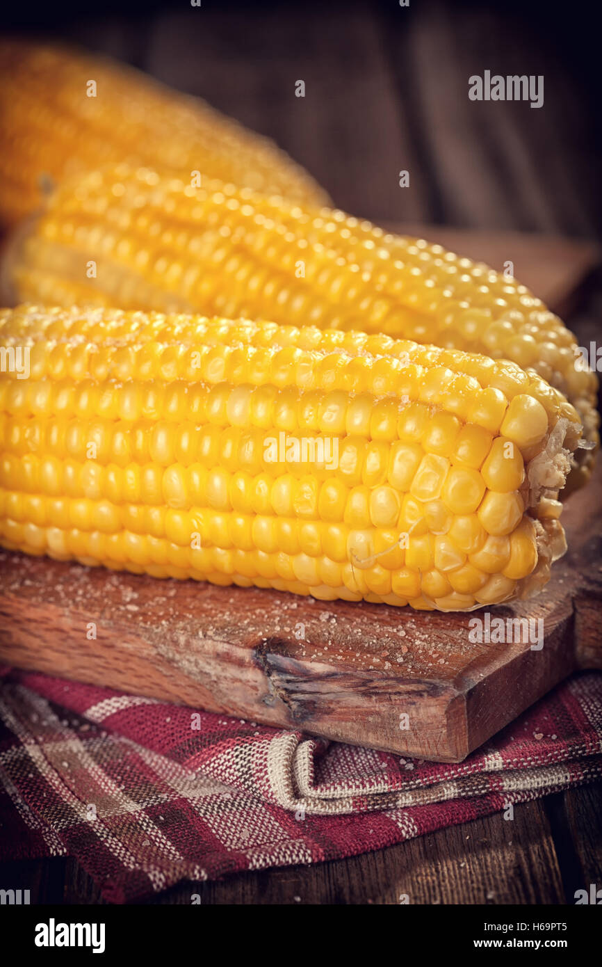 Corn cobs on with copy space Stock Photo - Alamy