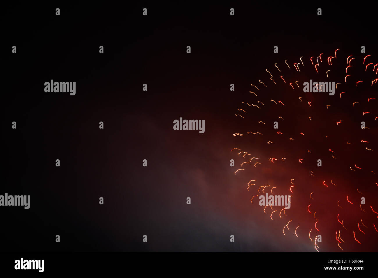 Festive colour firework background at a dark night Stock Photo - Alamy