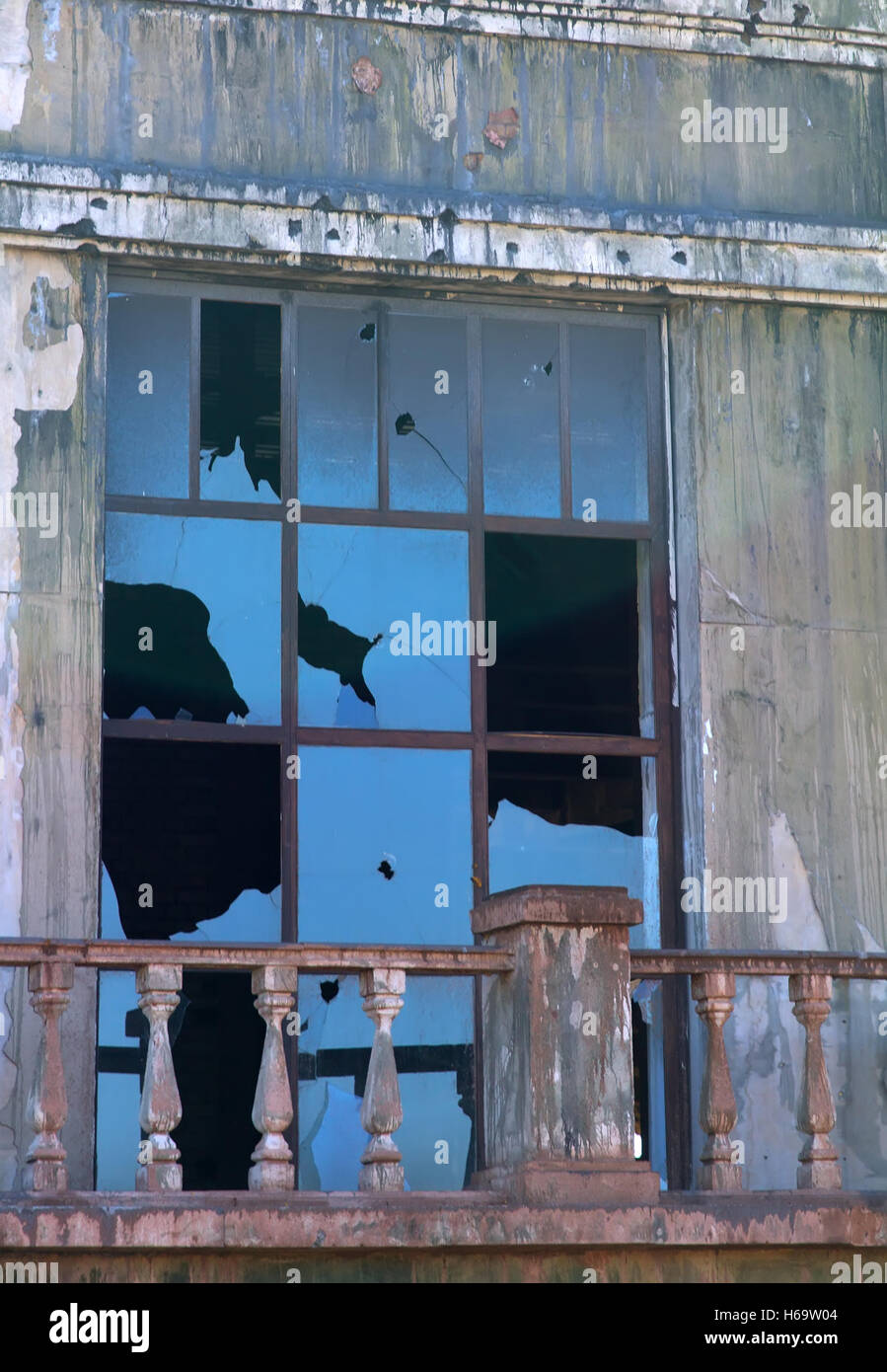 broken window in a wall of the collapsed house Stock Photo - Alamy