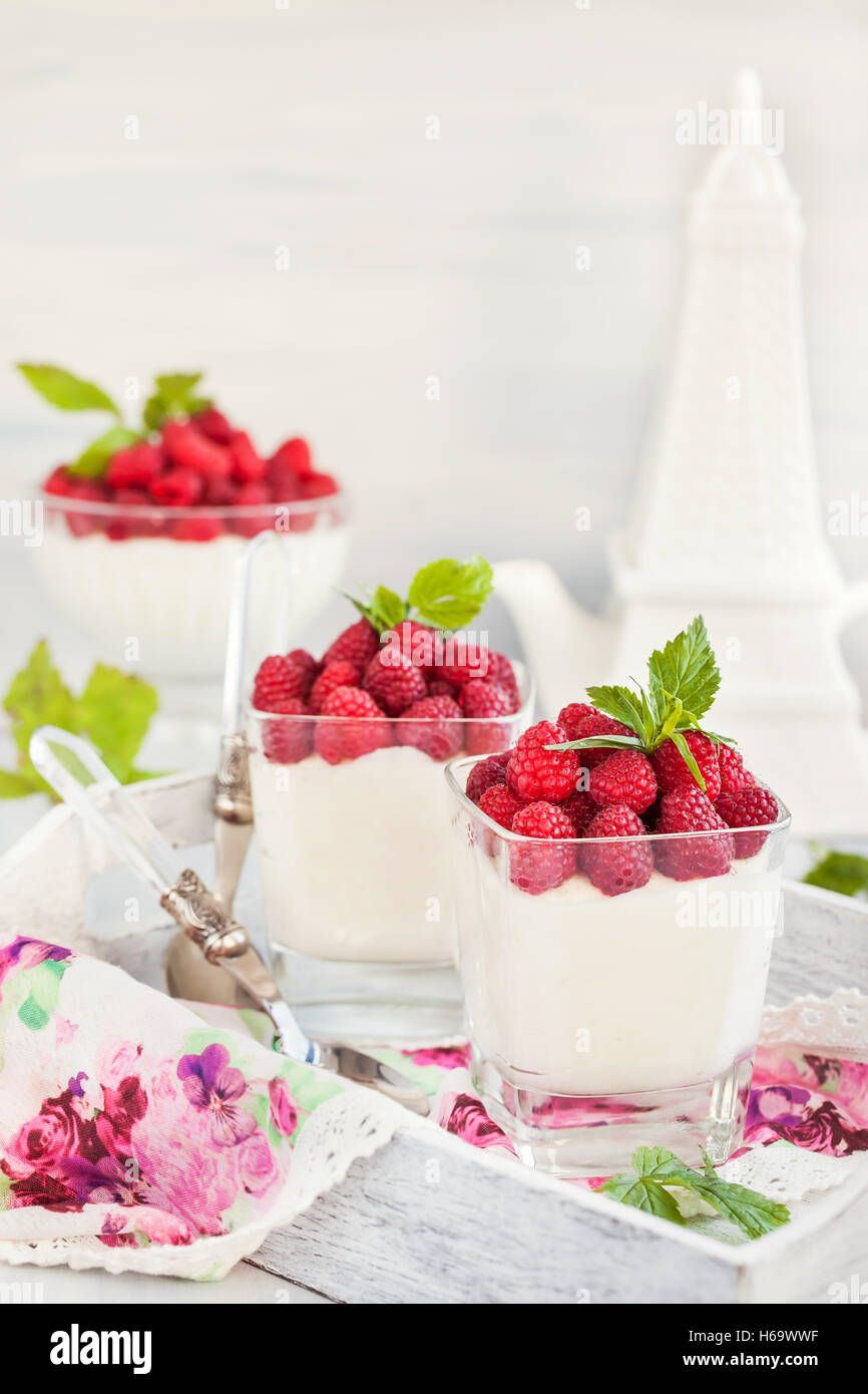 Delicious sweet creamy mousse in a glass decorated with fresh ...