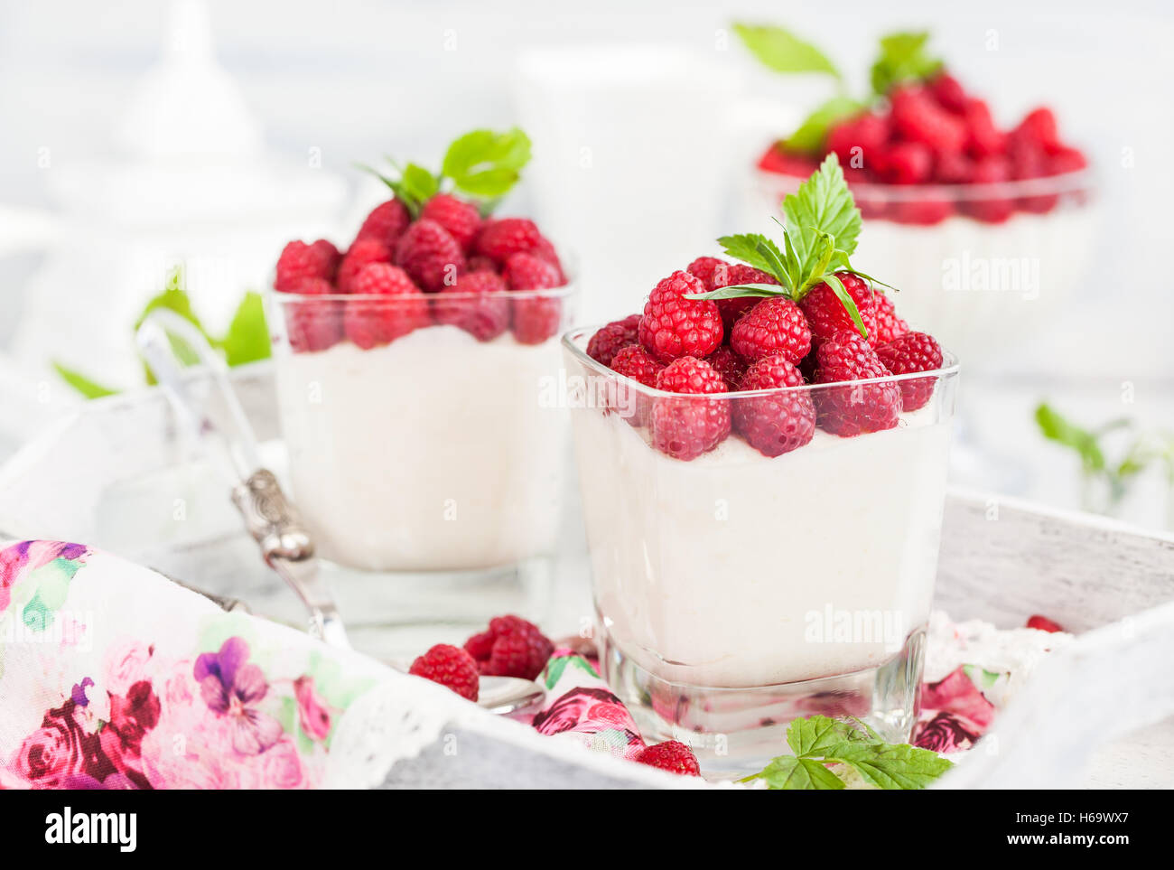 Delicious sweet creamy mousse in a glass decorated with fresh ...