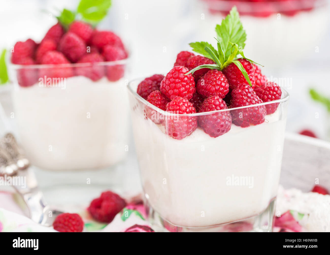 Delicious sweet creamy mousse in a glass decorated with fresh ...