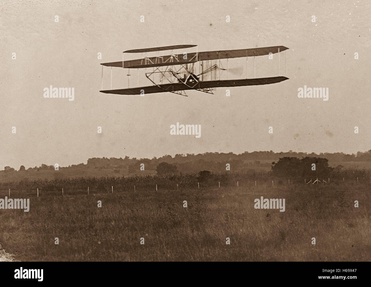 Flight 23: front view of the machine in flight to the right, Orville at ...