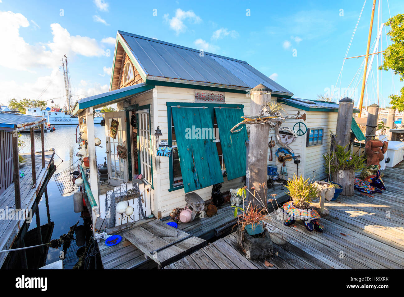 Quirky houseboat moored at dock behind the Hogfish Bar & Grill. A great ...