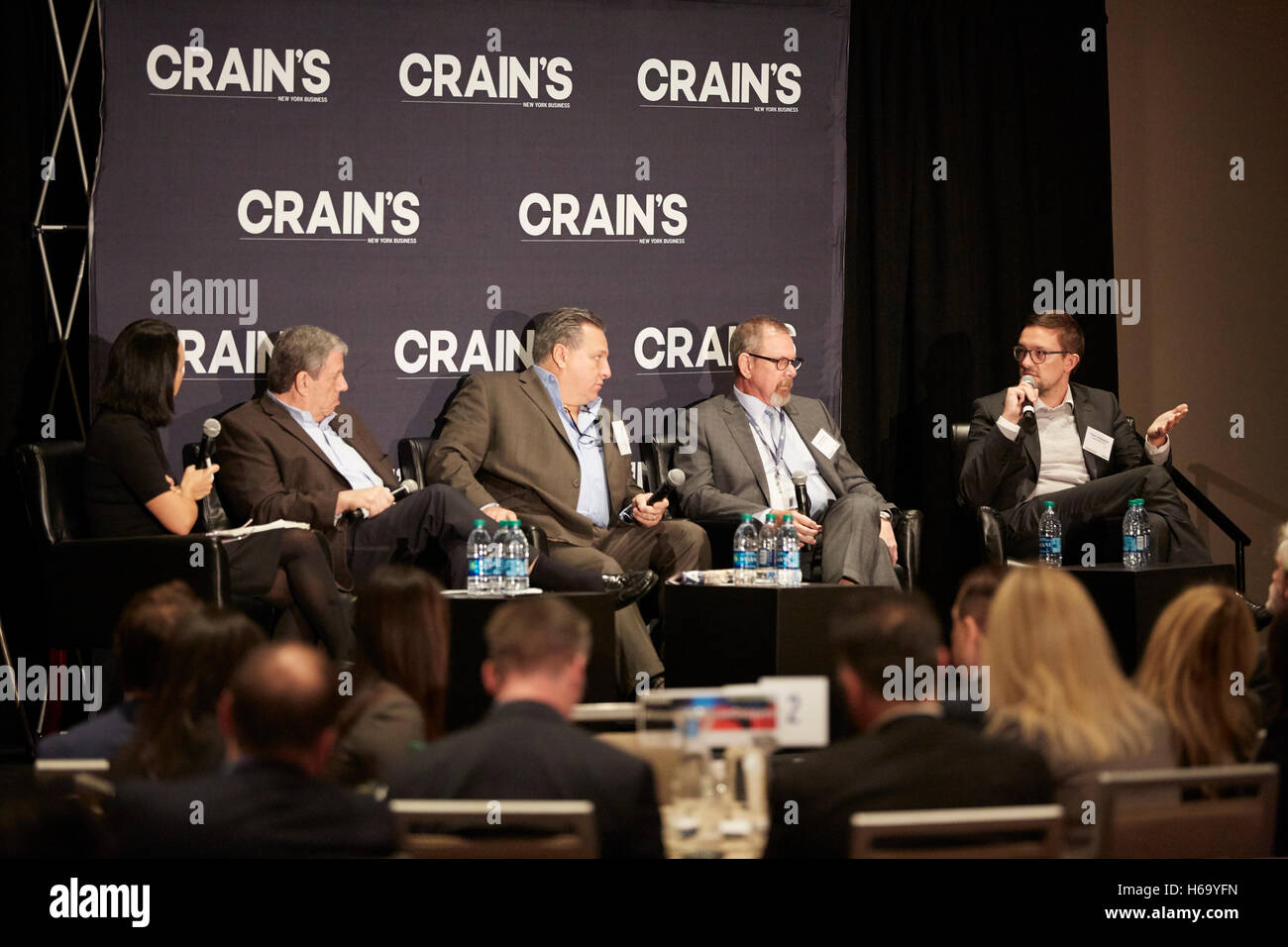 New York, United States. 25th Oct, 2016. (Left to Right) Moderator ...