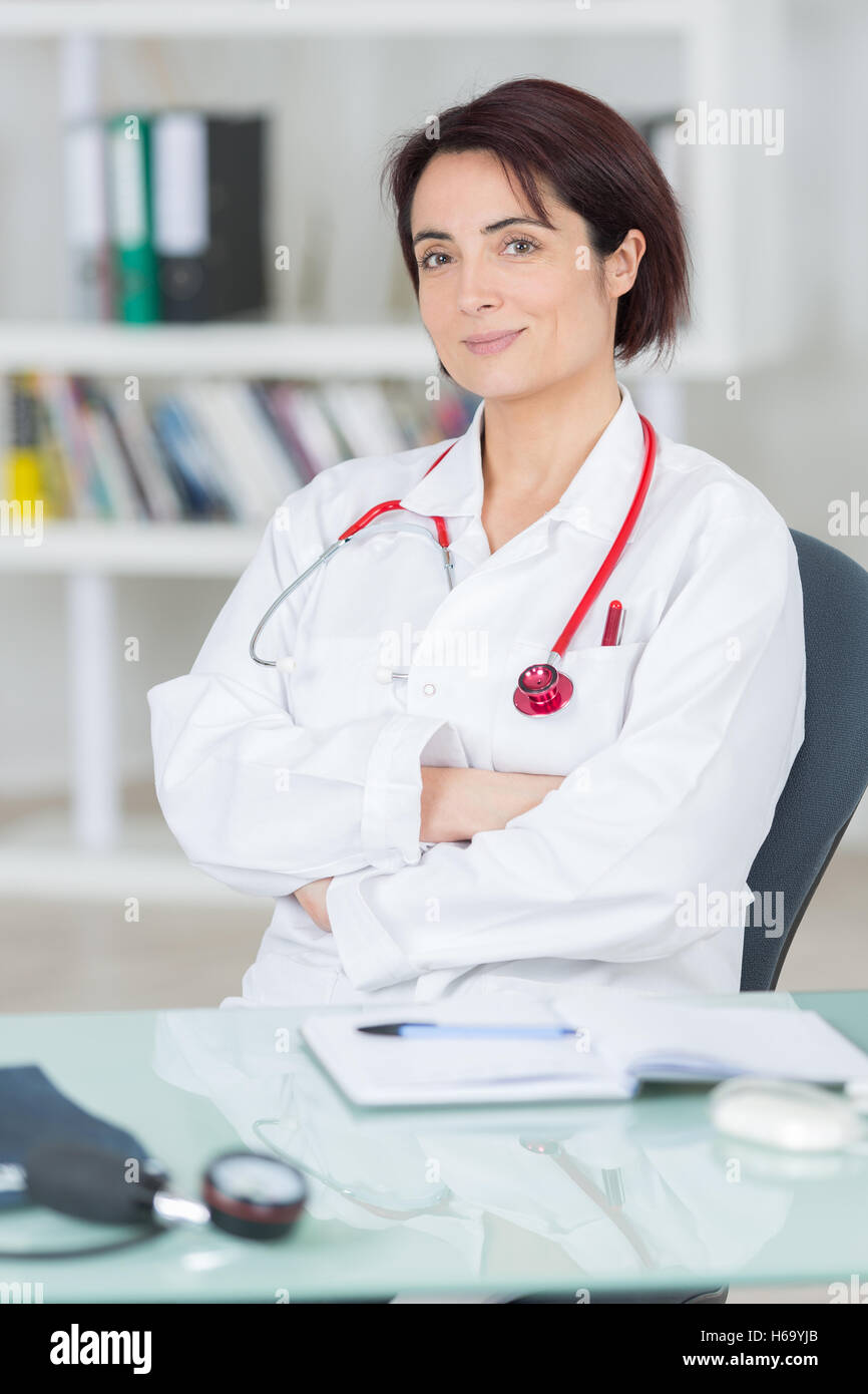 doctor sitting down Stock Photo - Alamy