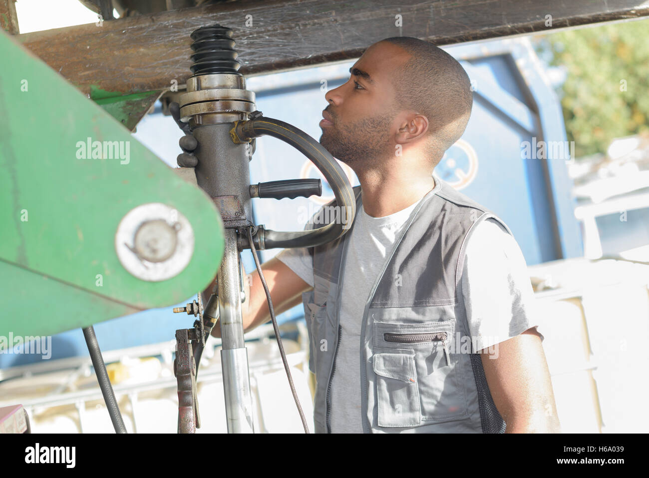 worker of recycling factory Stock Photo - Alamy