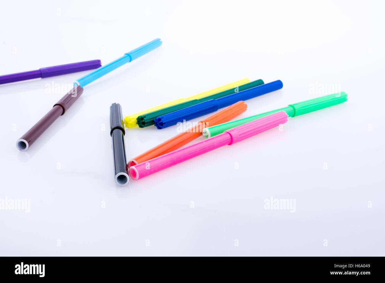 Color felt-tip pens of various color on white background Stock Photo ...