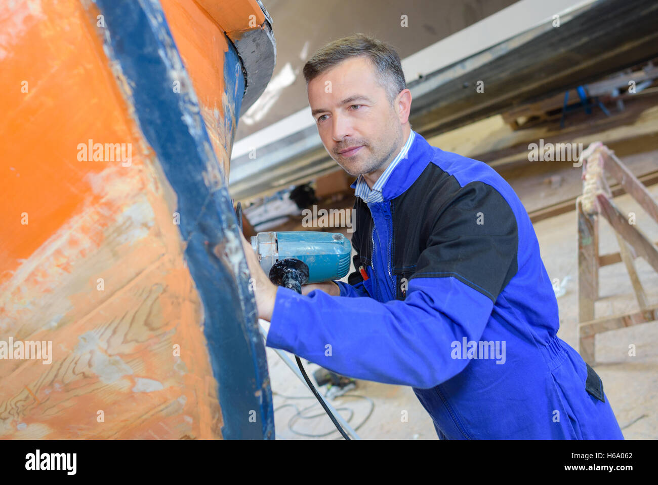 inspecting the boat hull Stock Photo - Alamy