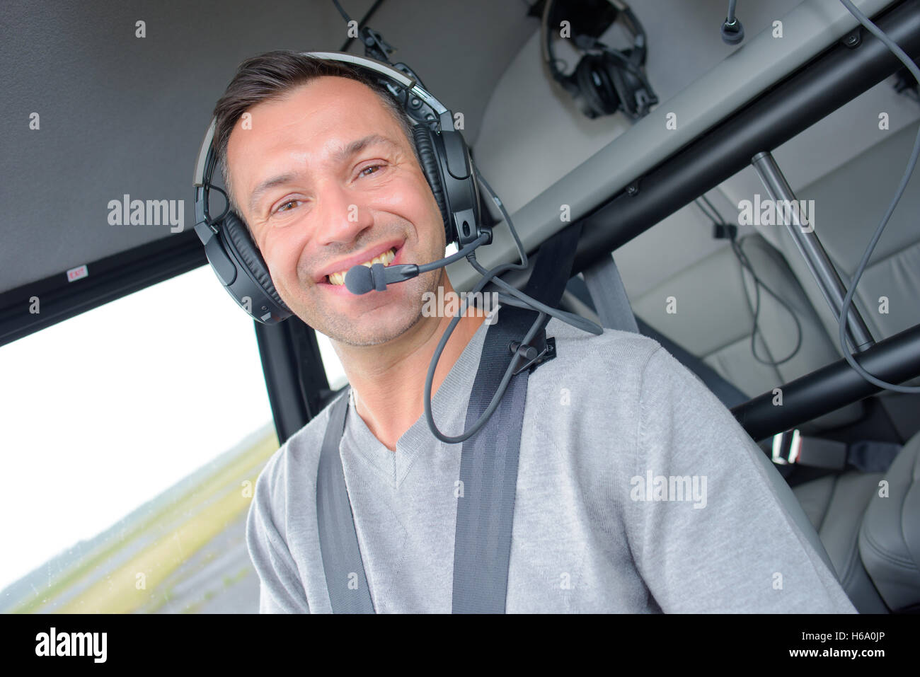 helicopter pilot flying Stock Photo - Alamy