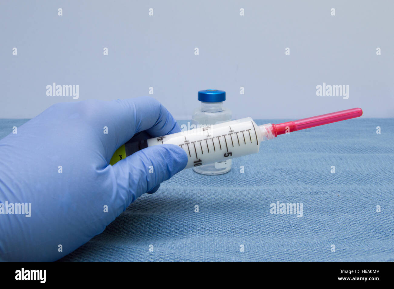 Left Hand Holding Syringe of the Michael Jackson Drug, Propofol, an ...