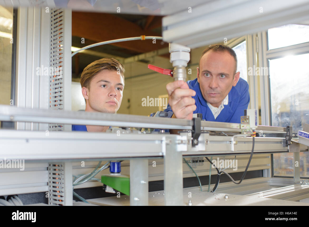 Junior technician hi-res stock photography and images - Alamy