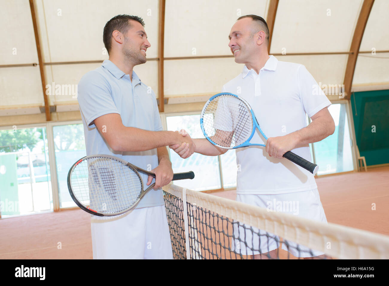 tennis players shaking hands Stock Photo - Alamy