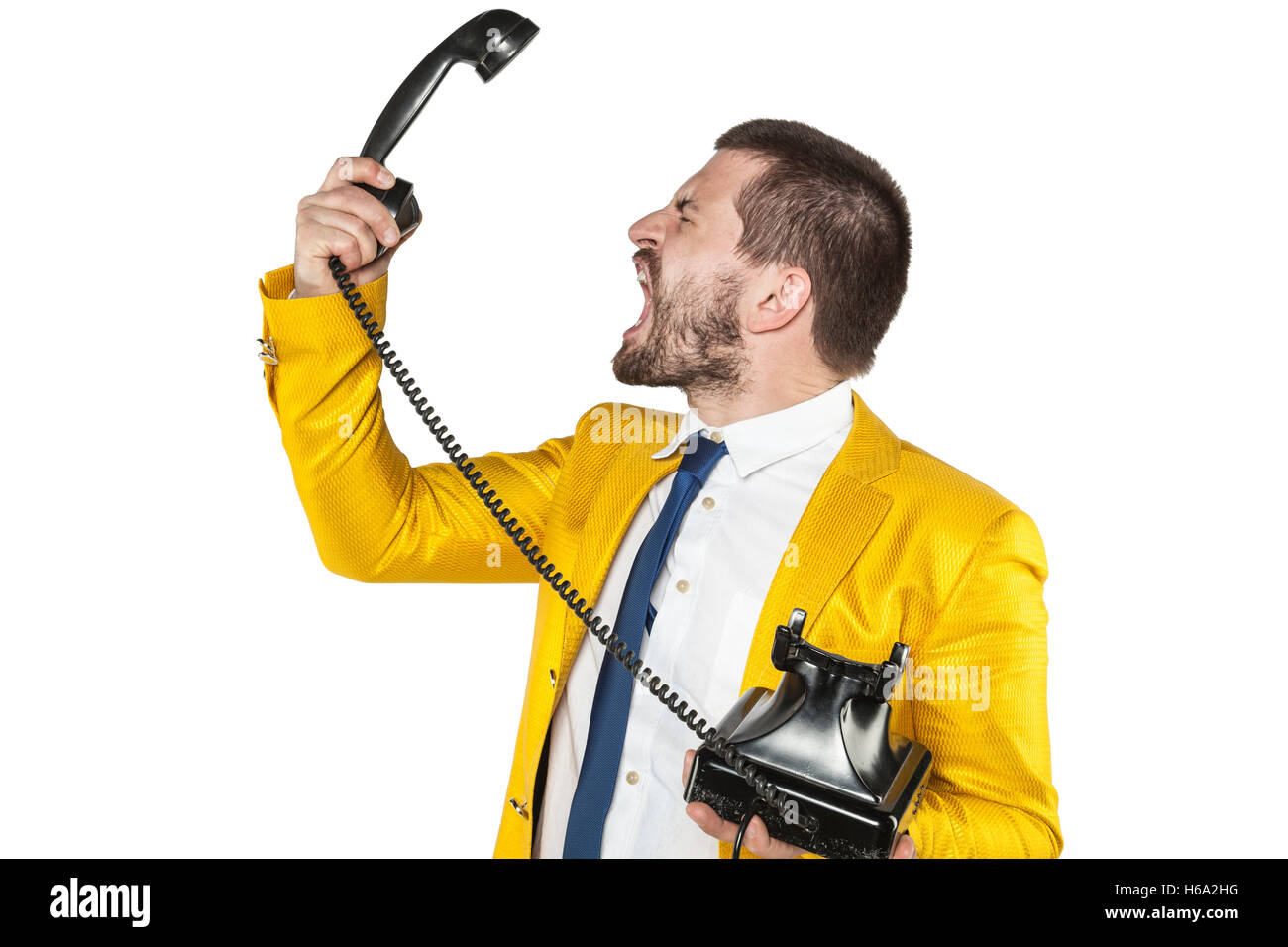 angry businessman screaming to the telephone handset Stock Photo - Alamy
