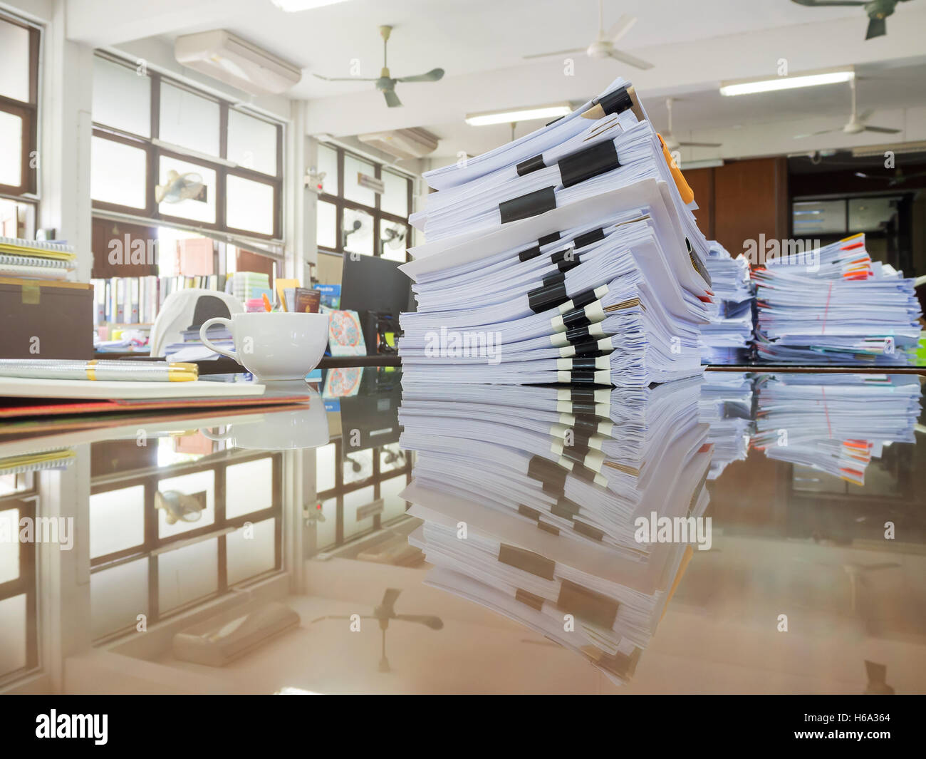 Business Concept, Pile of unfinished documents on office desk, Stack of ...