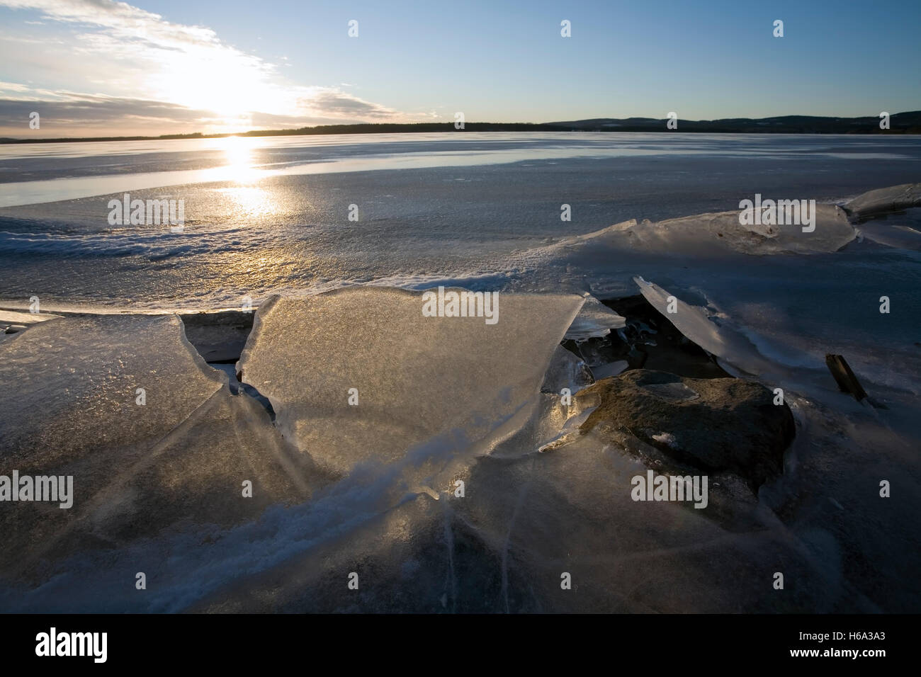 frozen lake surface, Finland Stock Photo - Alamy
