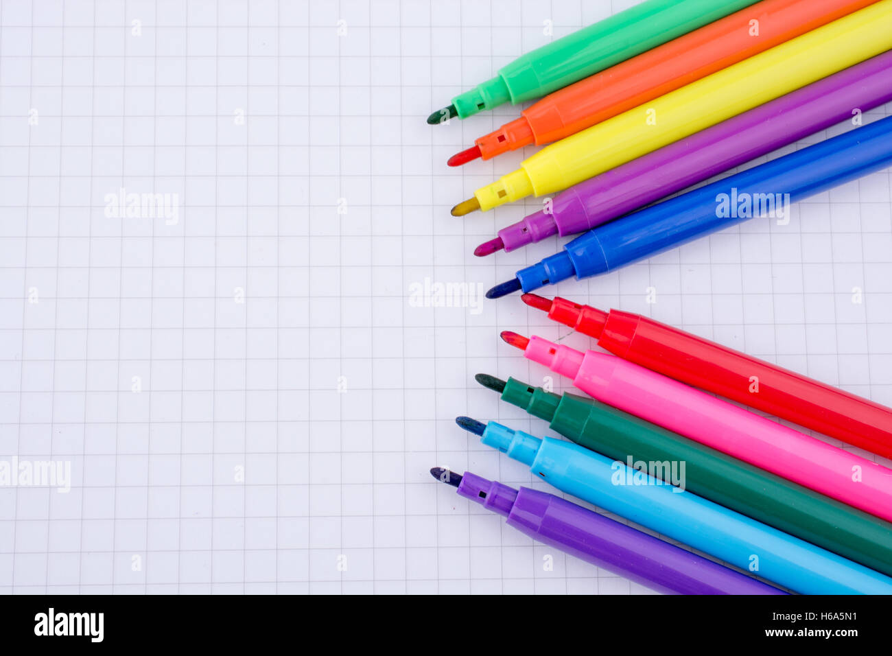 Colorful felt-tip pens on a notebook Stock Photo - Alamy