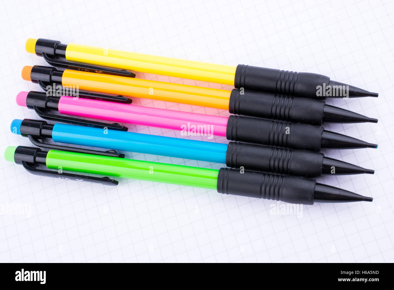 mechanical pencisl of various color on white background Stock Photo - Alamy