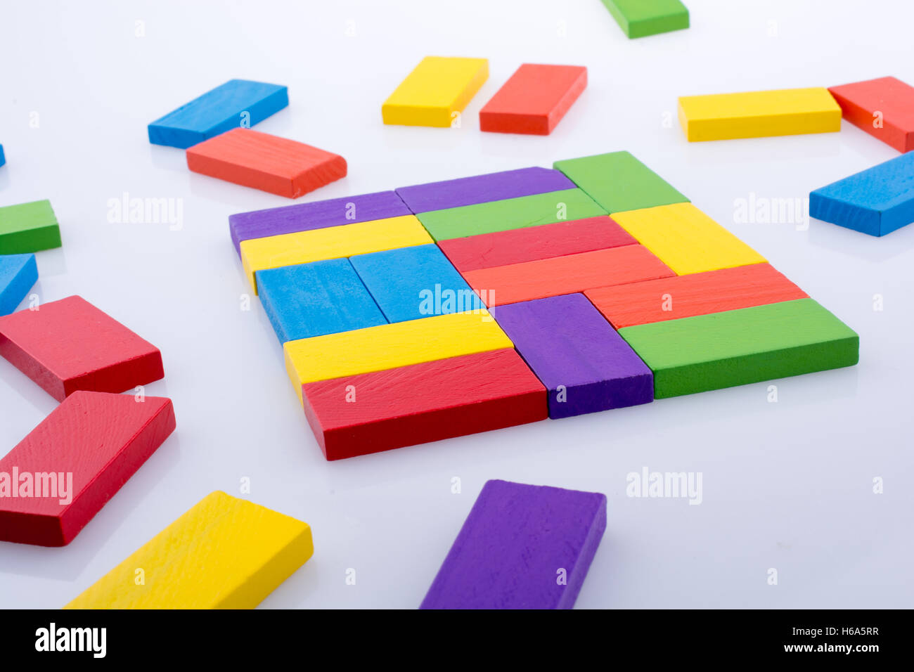 Colorful Domino Blocks on a white background Stock Photo - Alamy