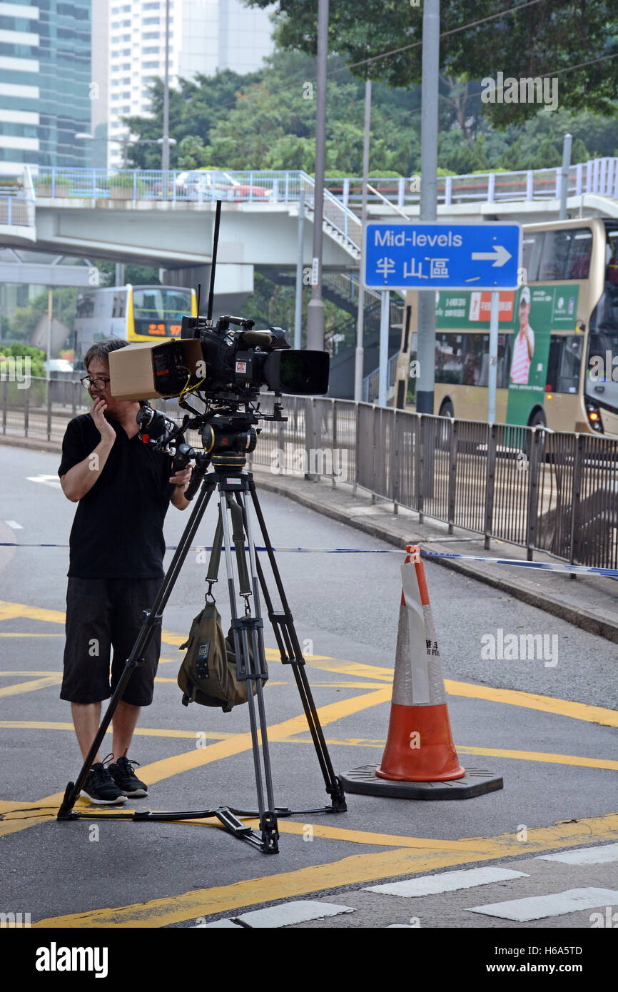 TV cameraman in street Hong Kong island Stock Photo - Alamy