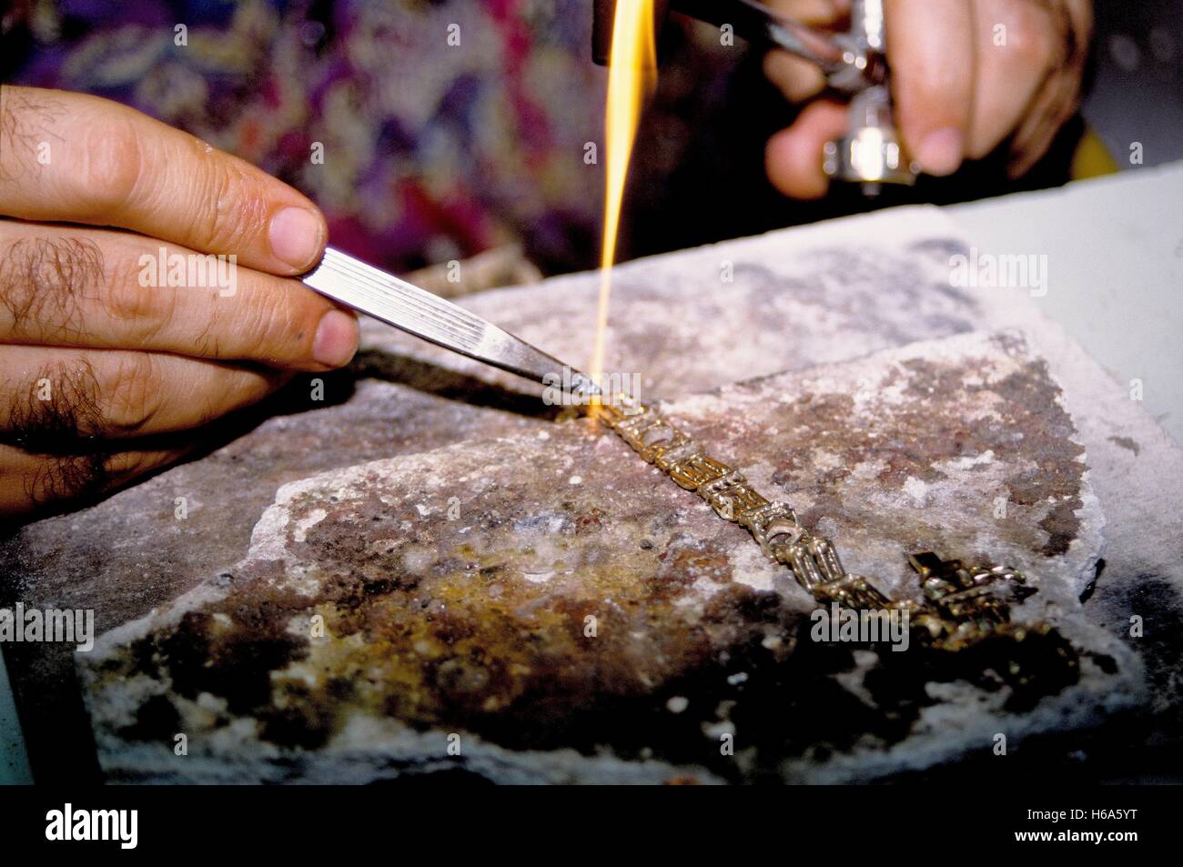 Armenian goldsmith Armen Sarkassian busy in his Damascus workshop ...