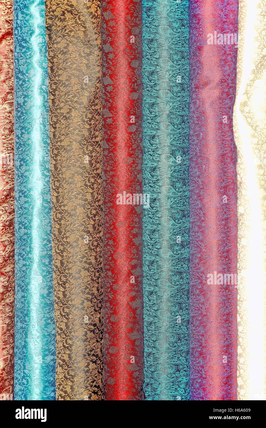 The result of often weeks of manual labour: rolls of shining Brocade on ...