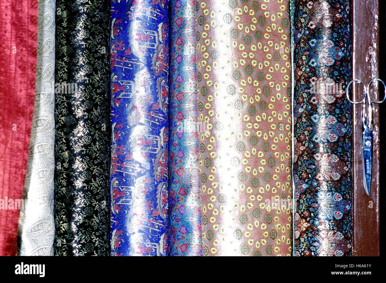 The result of often weeks of manual labour: rolls of shining Brocade on ...