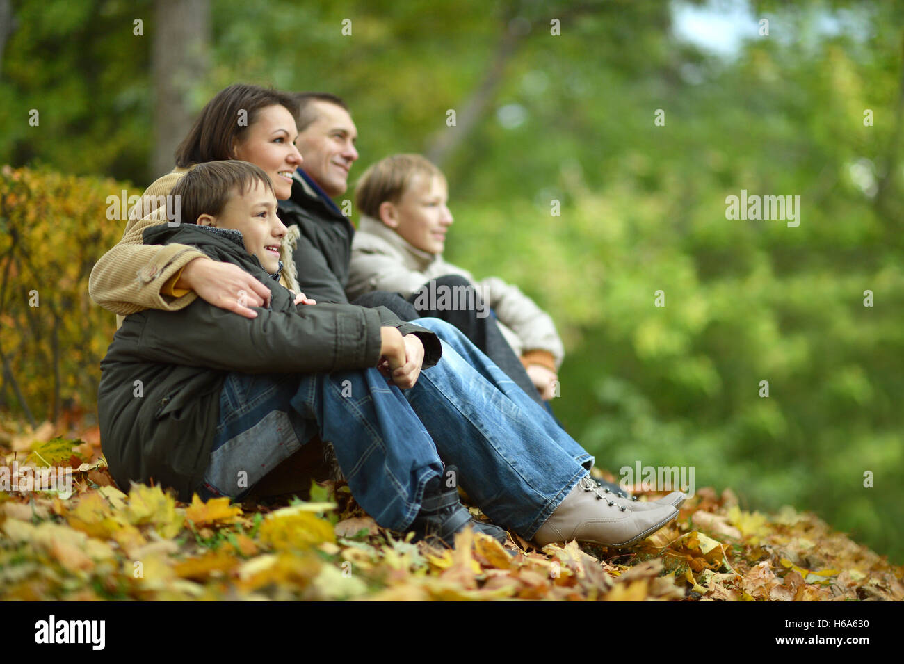 happy family relaxing Stock Photo - Alamy